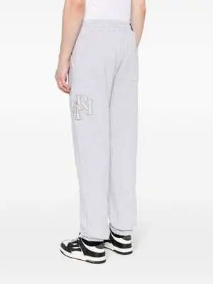 Amiri Staggered Logo-embroidered Track Pants