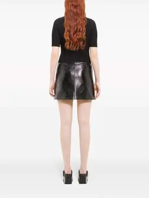 COURREGES Ac Ribbed-knit Polo Shirt - Black