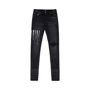 Amiri Paint Drip Logo Jeans