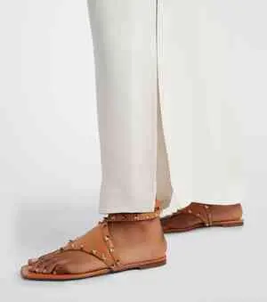 Valentino Garavani Rockstud Leather Thong Sandals - Beige