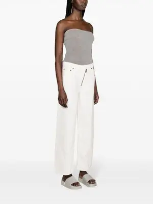 FRAME Angled Zipper Tapered-leg Jeans