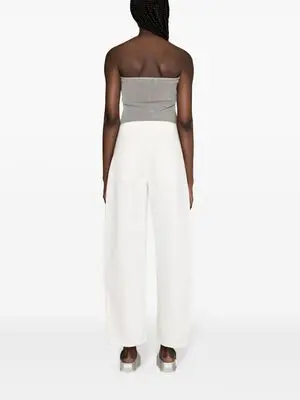 FRAME Angled Zipper Tapered-leg Jeans