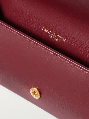 Saint Laurent Cassandre Strap Textured-leather Phone Case - Burgundy