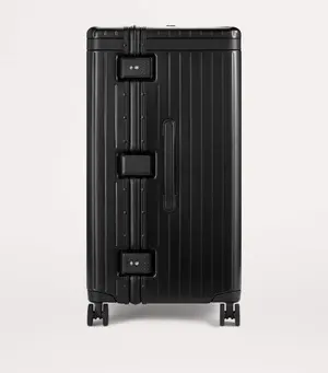 CARL FRIEDRIK Trunk Spinner Check-in Suitcase - Black