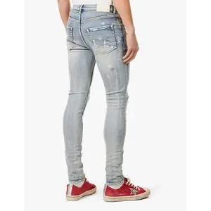 PURPLE BRAND P001 Paint Blowout Slim-fit Stretch-denim Jeans - Light Indigo