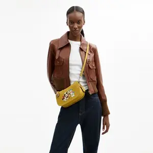 COACH Disney X Swinger Bag In Regenerative Leather With Mickey Mouse And Friends