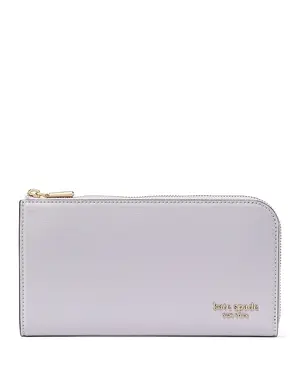 Kate Spade New York Zip Around Continental Wallet - Lavender C