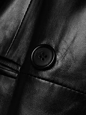 Khaite Lolo Belted Leather Coat