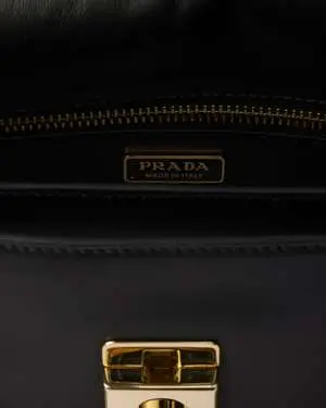 Prada Soft Sound Leather Shoulder Bag With Charms - Black