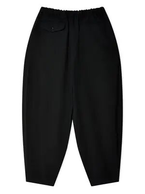 BLACK COMME DES GARÇONS Tapered-leg Trousers