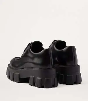 Prada Monolith Lace-up Loafers