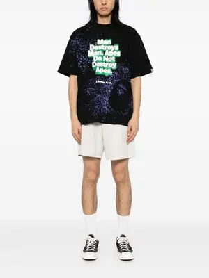 A BATHING APE Spray-print Slogan T-shirt - Black