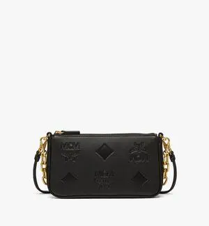 Mcm Embossed Cross Body Bags