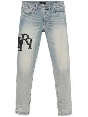 Amiri Staggered Logo Skinny Jeans - Blue