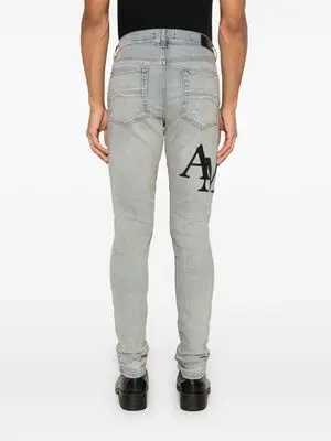 Amiri Staggered Logo Skinny Jeans - Blue