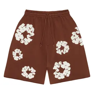 DENIM TEARS Cotton Wreath Shorts Brown