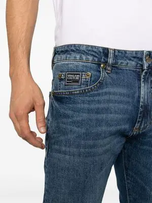 Versace Logo-appliqué Slim-cut Jeans