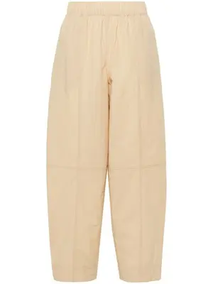 GANNI Curve Tapered-leg Trousers