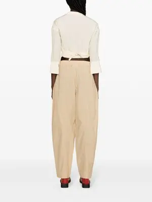 GANNI Curve Tapered-leg Trousers