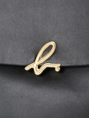 Agnes B. Logo-Clasp Leather Crossbody Bag In Black - 50% Off