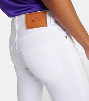 Versace Embellished Low-rise Flared Jeans