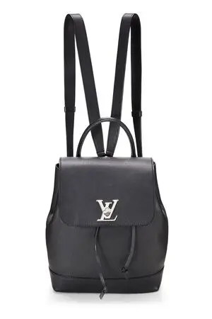 LOUIS VUITTON Leather Lock Me Backpack