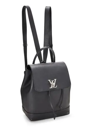 LOUIS VUITTON Leather Lock Me Backpack