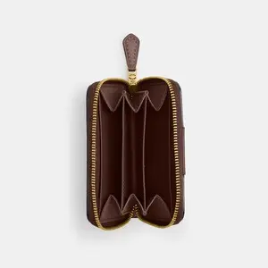 COACH Essential Small Zip Around Card Case In Signature Canvas - Brass/maple