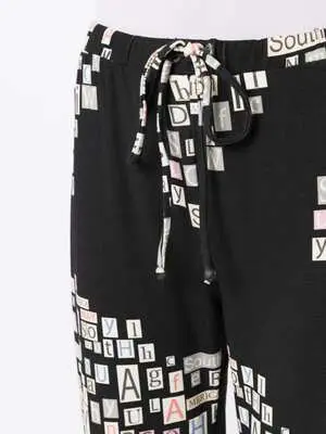 AMIR SLAMA Text-print Trousers