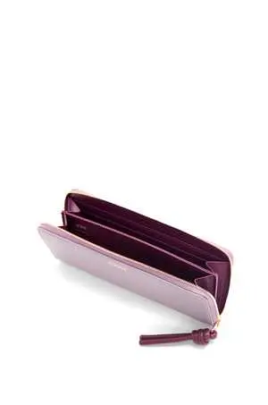 Loewe Luxury Knot Zip Around Wallet In Shiny Nappa Calfskin Dirty Mauve/burgundy