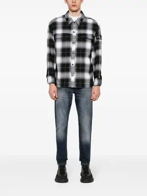 Calvin Klein Mid-rise Tapered-leg Jeans