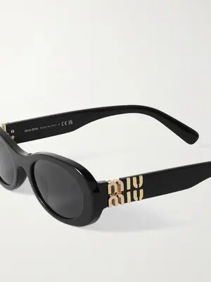 Miu Miu Oval Sunglasses