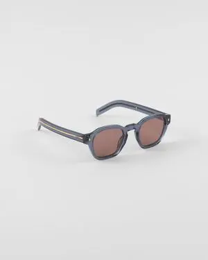 Prada Sunglasses With Iconic Metal Plaque