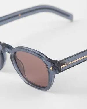 Prada Sunglasses With Iconic Metal Plaque