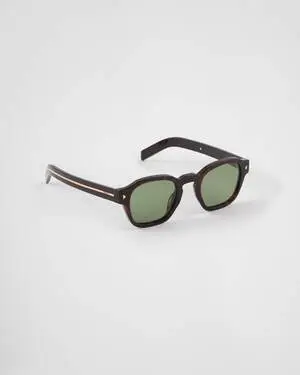 Prada Sunglasses With Metal Plaque