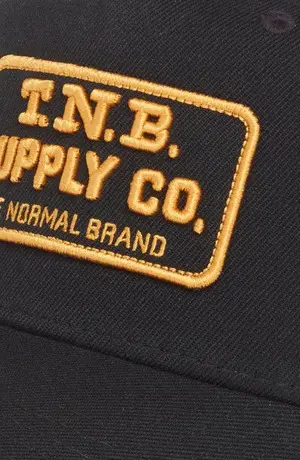 THE NORMAL BRAND Supply Co. Trucker Hat