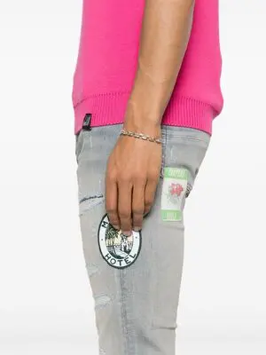 Amiri Travel Patch Repair Skinny Jeans