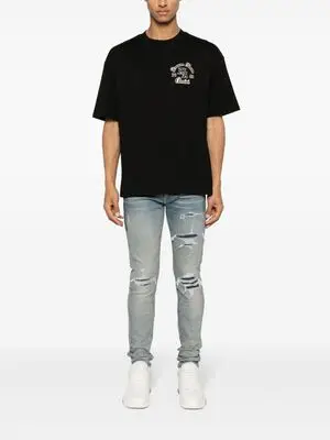 Amiri Distressed Skinny Jeans