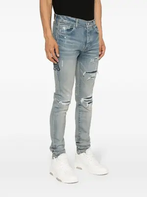 Amiri Distressed Skinny Jeans