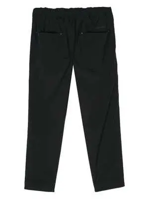 AND WANDER Belted Tapered-leg Trousers - Black