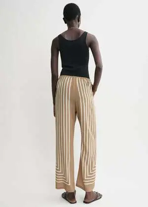 TOTEME Monogram Silk Slacks