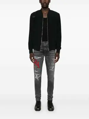 Amiri Distressed Skinny Jeans