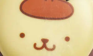 THE CREME SHOP X Hello Kitty® Pompompurin Caramel Pudding Macaron Lip Balm