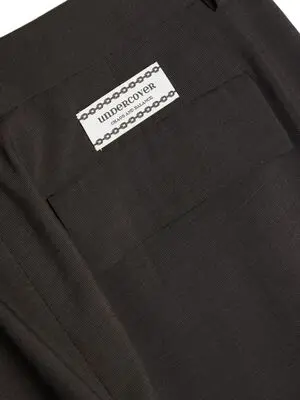 Undercover Logo Appliqué Tapered Trousers