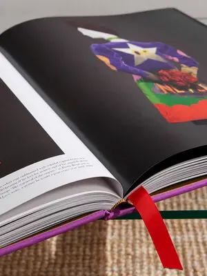 Assouline Yves Saint Laurent: The Impossible Collection Hardcover Book - Purple