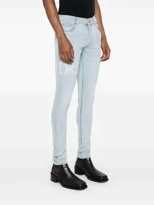 Amiri Bandana-jacquard Logo Appliqué Jeans