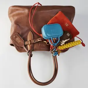 Miu Miu Cord And Nylon Trick - Yellow | Editorialist