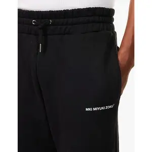 MKI MIYUKI ZOKU Brand-print Cotton-blend Jogging Bottoms - Black