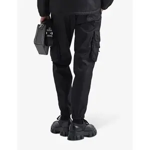 Prada Re-nylon Buckle-embellished Tapered Slim-fit Trousers