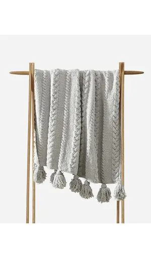 SUNDAY CITIZEN Braided Pom Pom Throw In Grey